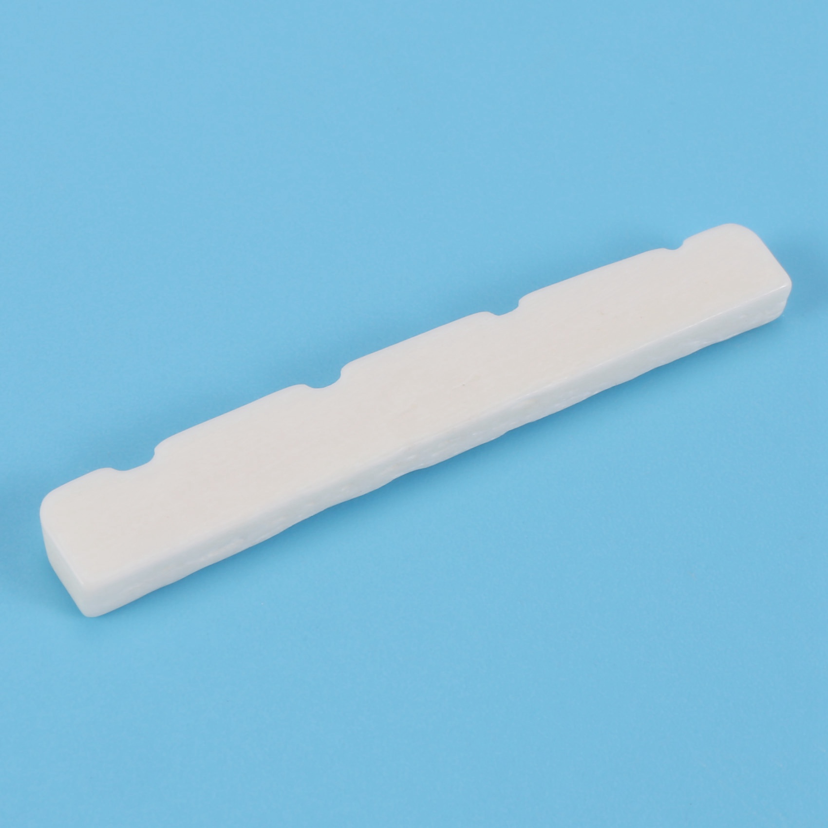 Slotted Curved Bone for 4 Strings Jazz Bass, 4.2x3.2x4.6/4.6mm | Daraz.pk