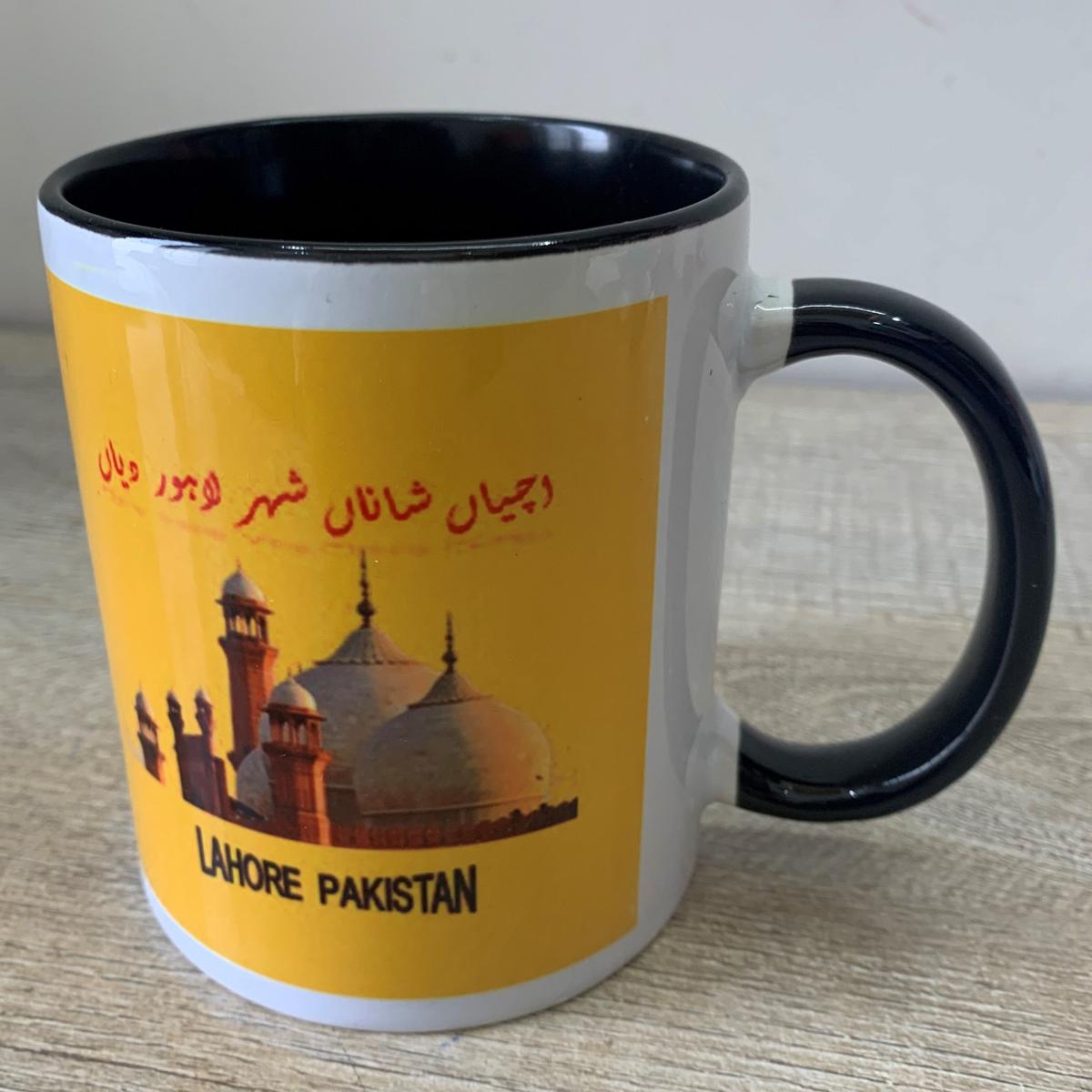 Lahore themed printed ceramic Mug in yellow and black color | Daraz.pk