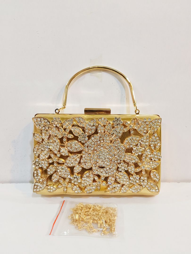 Quality Golden Metal Cut work Hand Clutch With Golden Chain. . | Daraz.pk